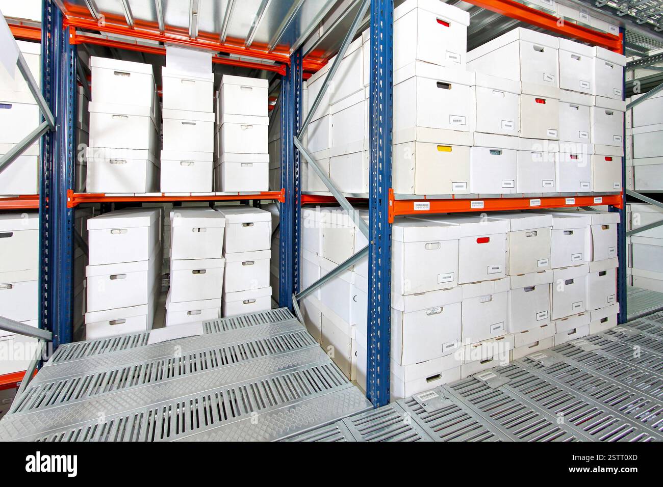 Bunch of white boxes in big storehouse hi-res stock photography and ...
