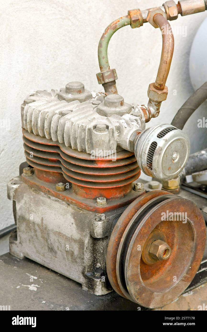 Close up shot of old air compressor Stock Photo - Alamy