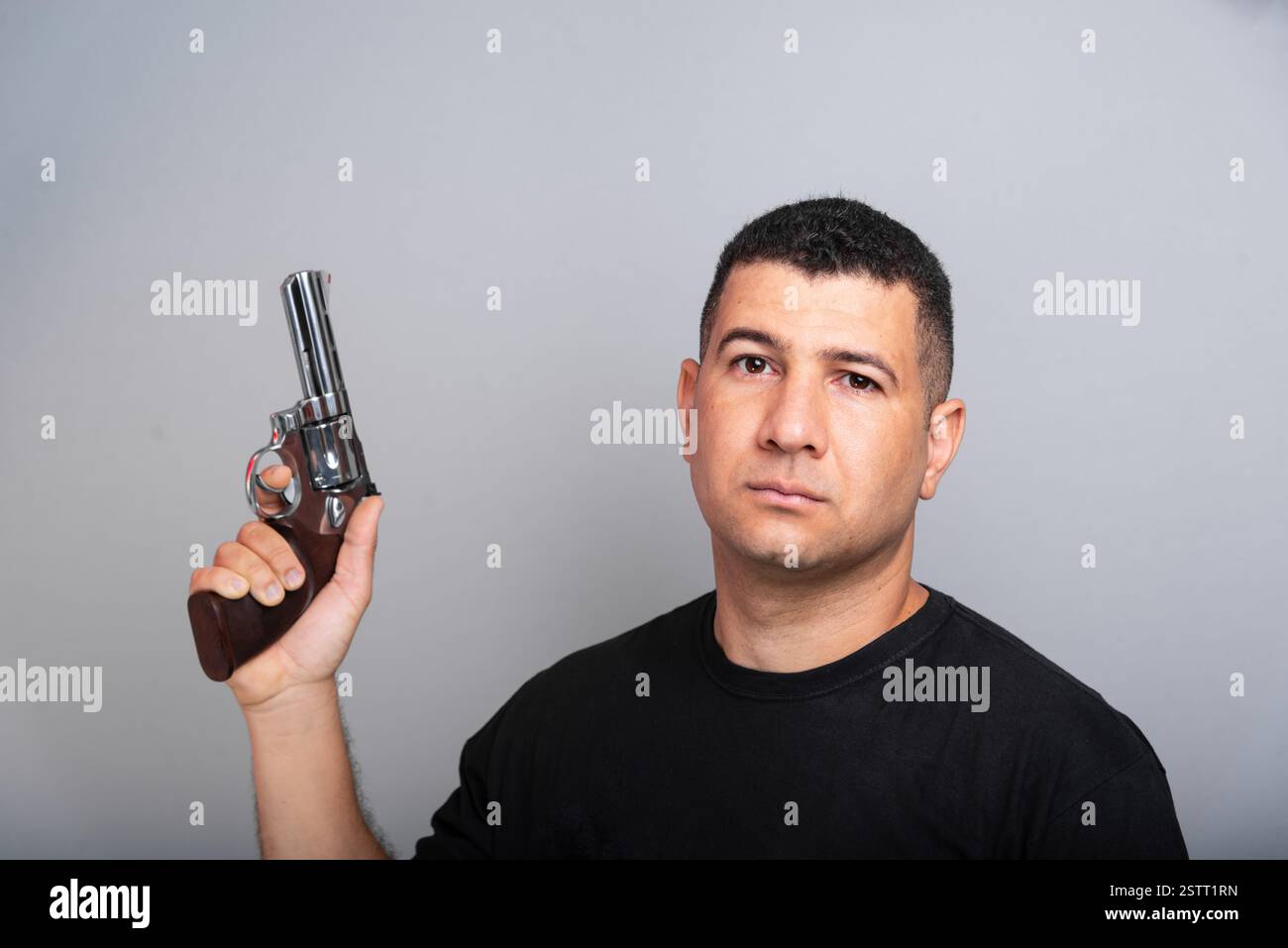 Attractive Caucasian man with brown hair – Action hero wearing black ...