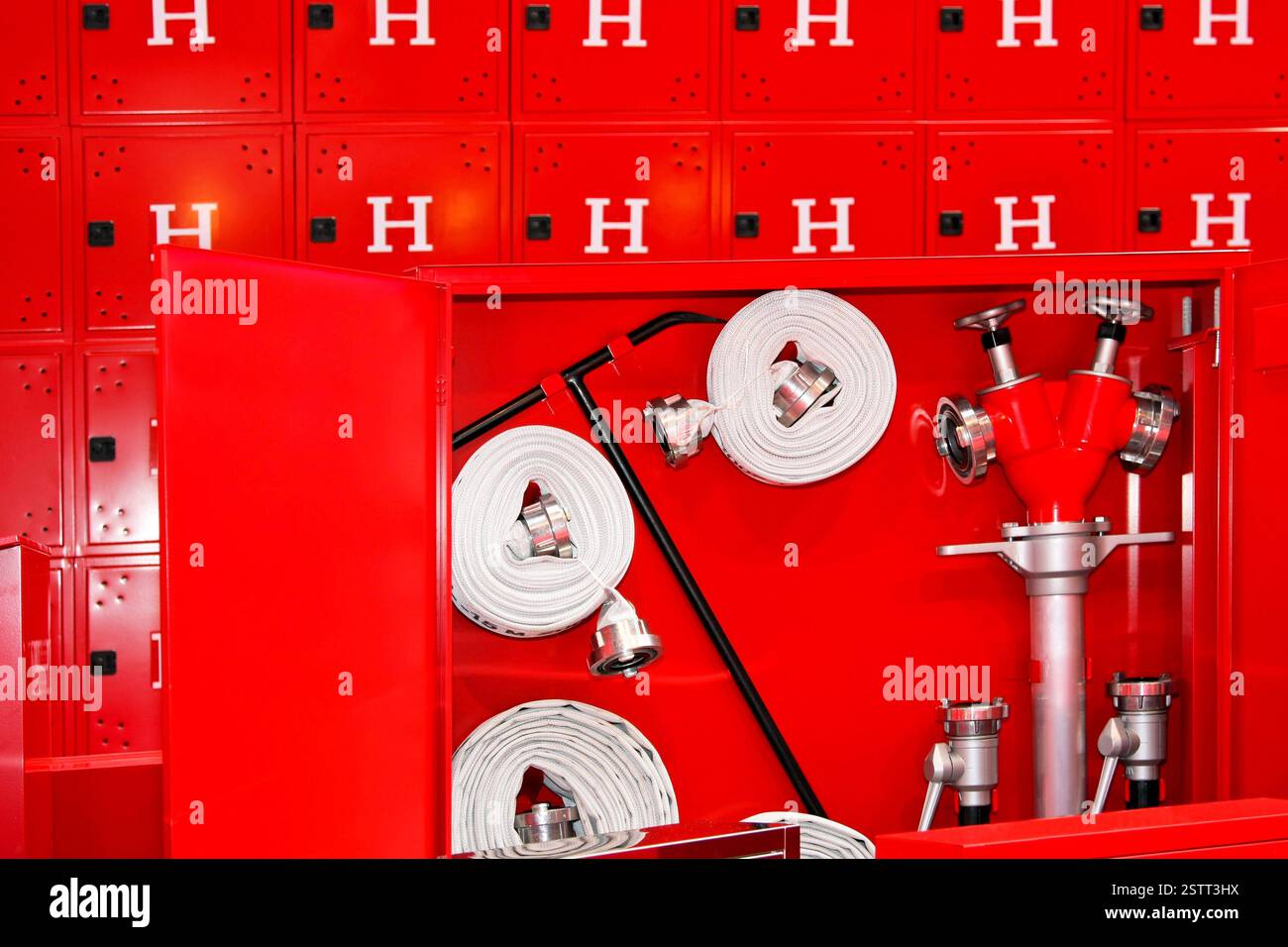 Complete mandatory fire hydrant and hose equipment Stock Photo - Alamy