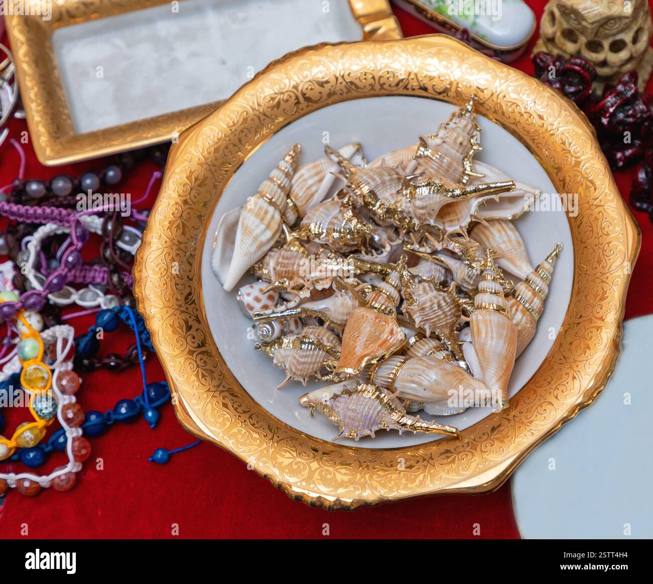 Gold Sea Shells Stock Photo - Alamy