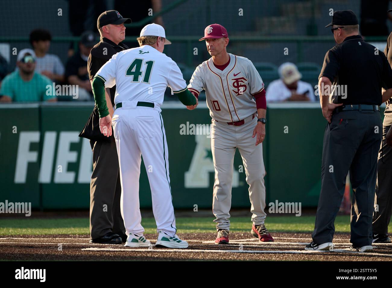 Florida State Seminoles head coach Link Jarrett (10) shakes hands with ...