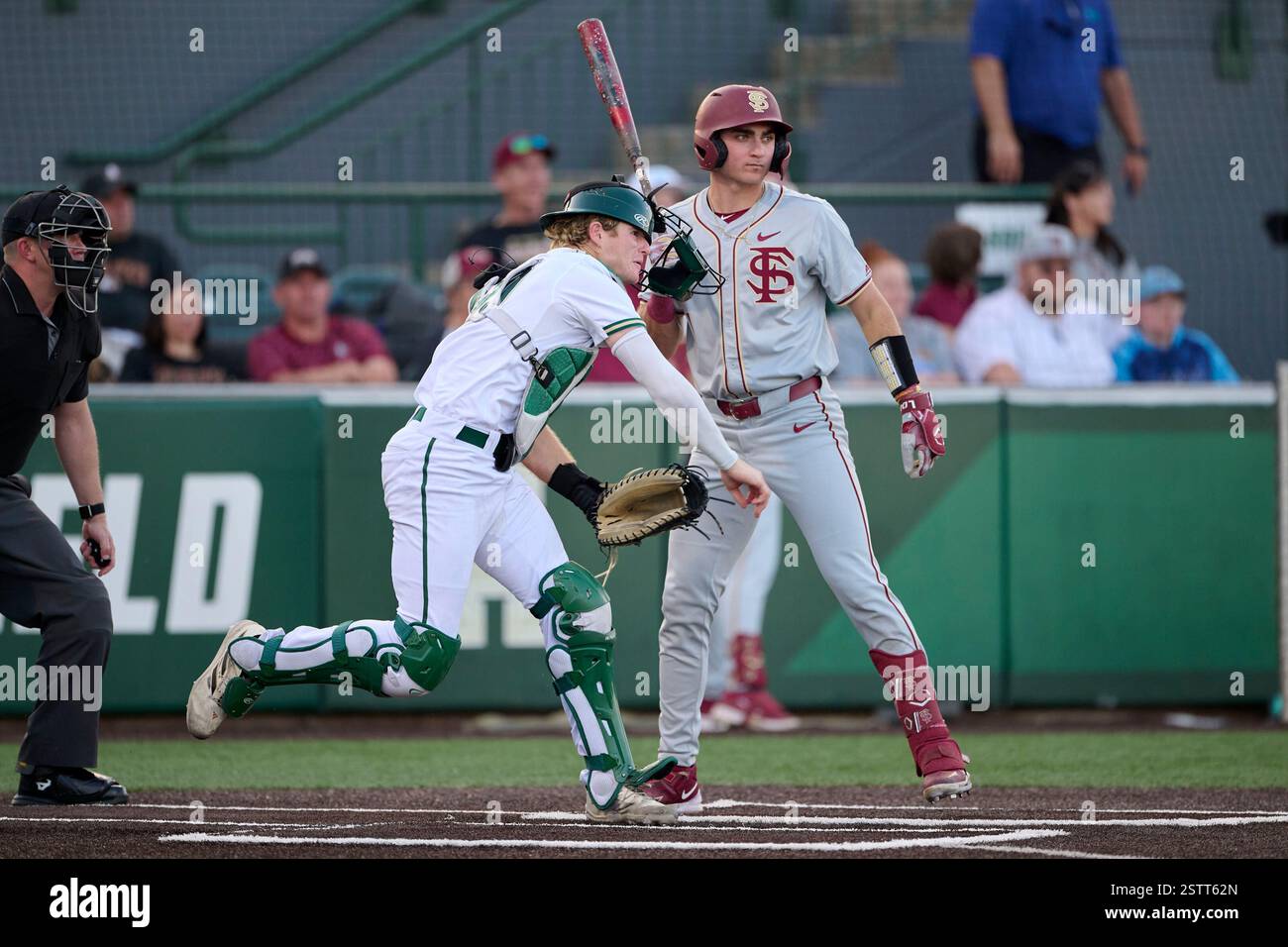 USF Bulls catcher Lance Trippel (20) throws a runner out on a stolen ...