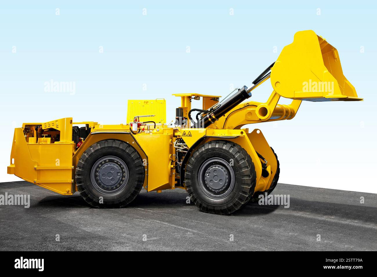 Yellow mining digger for underground hard work Stock Photo - Alamy