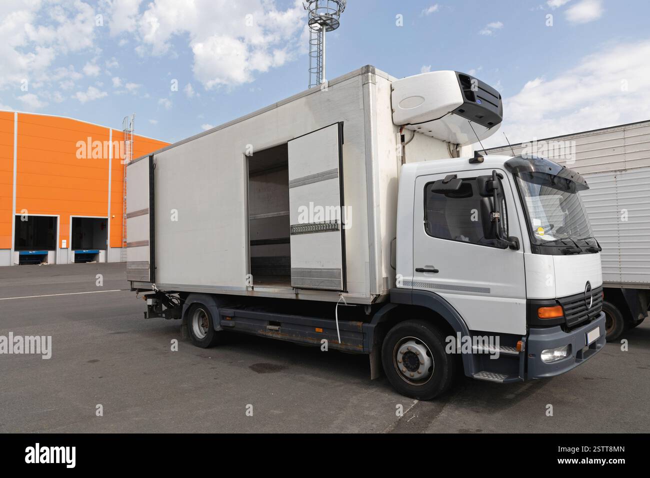 Refrigerated cargo transport truck with cooling unit hi-res stock ...