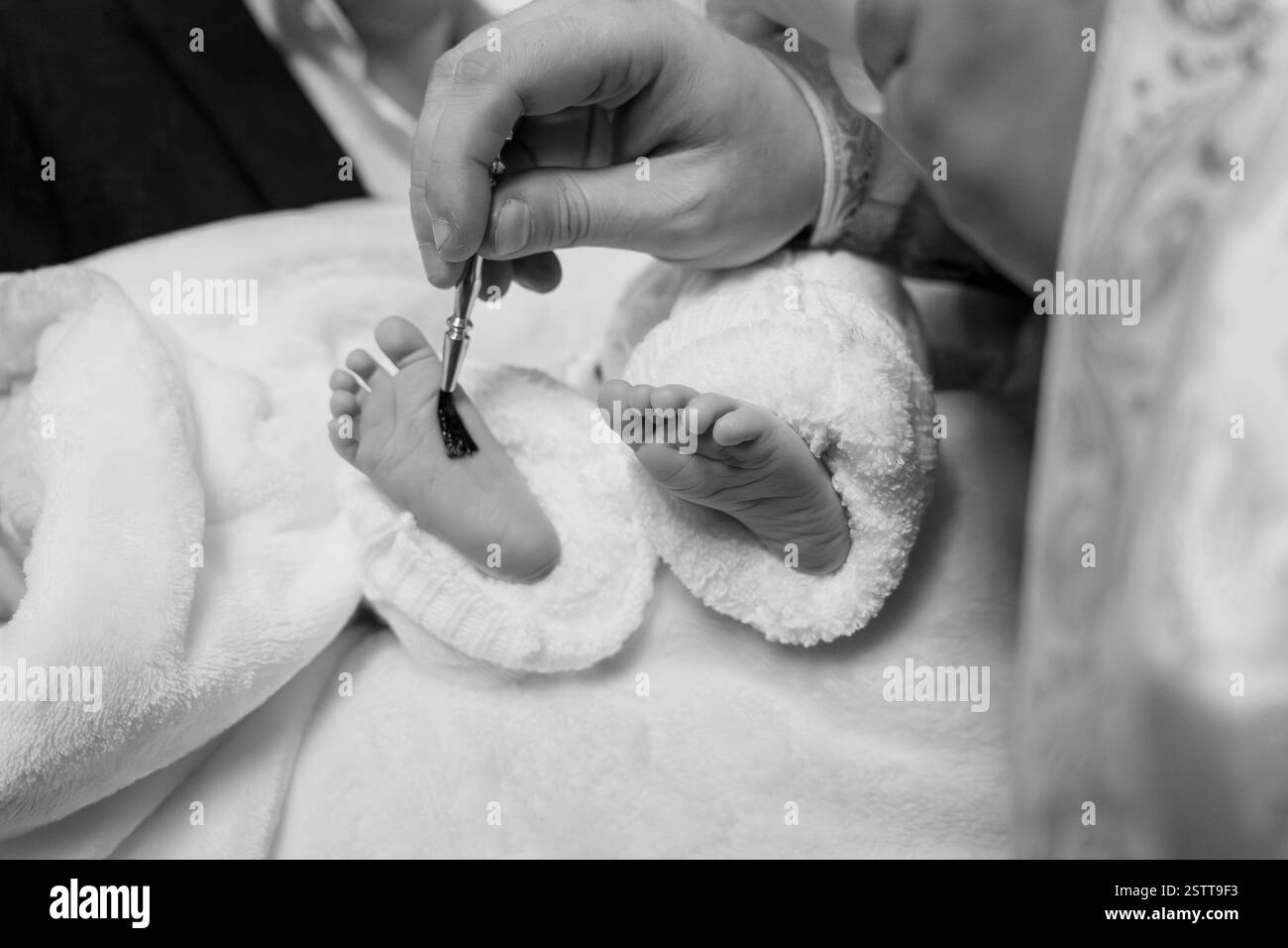 Tender Moments: A Parent's Gentle Touch Painting Tiny Toes Stock Photo ...