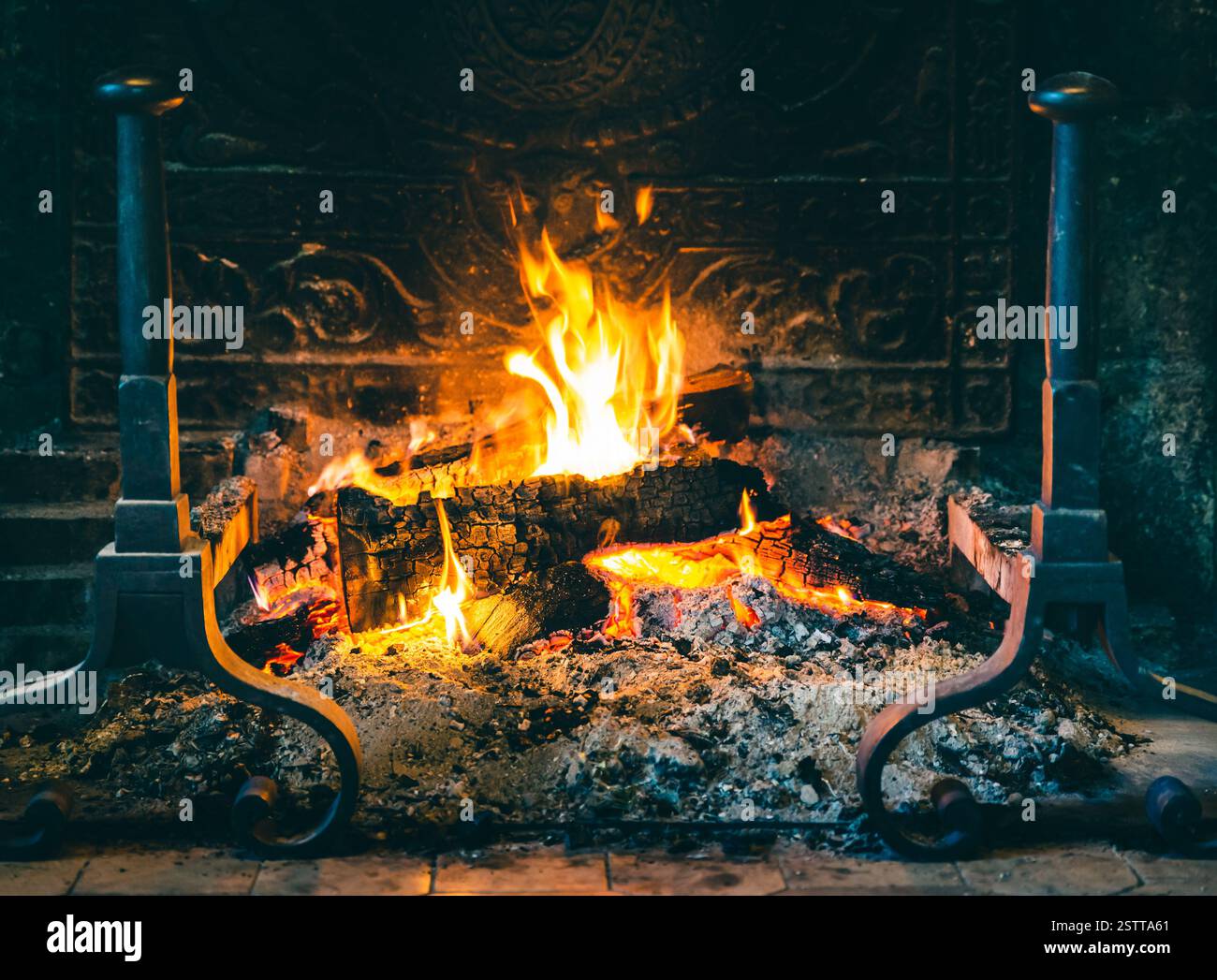 Fire in old chimney Stock Photo - Alamy