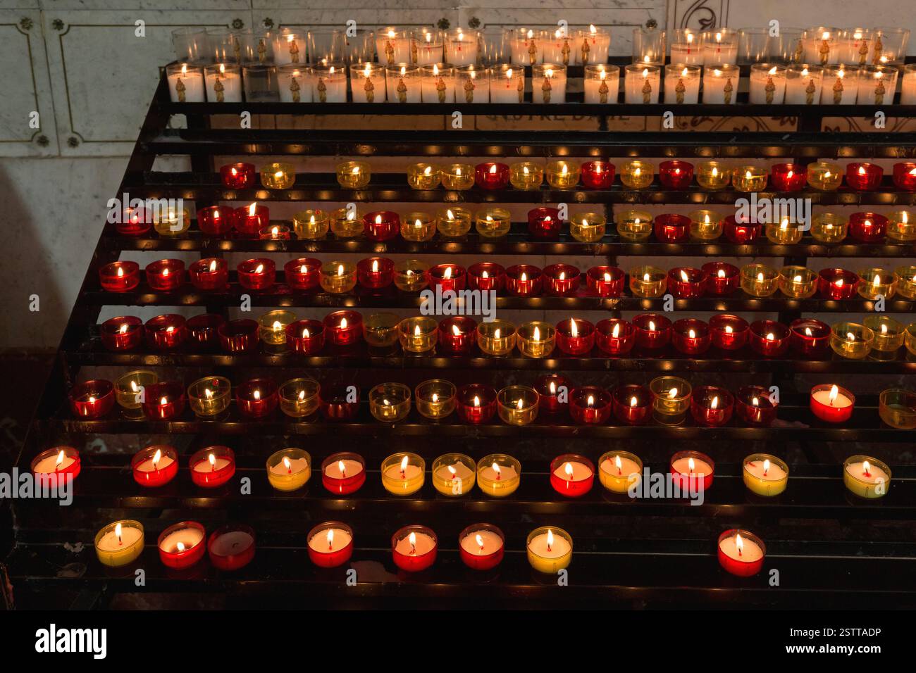 Prayer Offering Candle Rack Stock Photo - Alamy