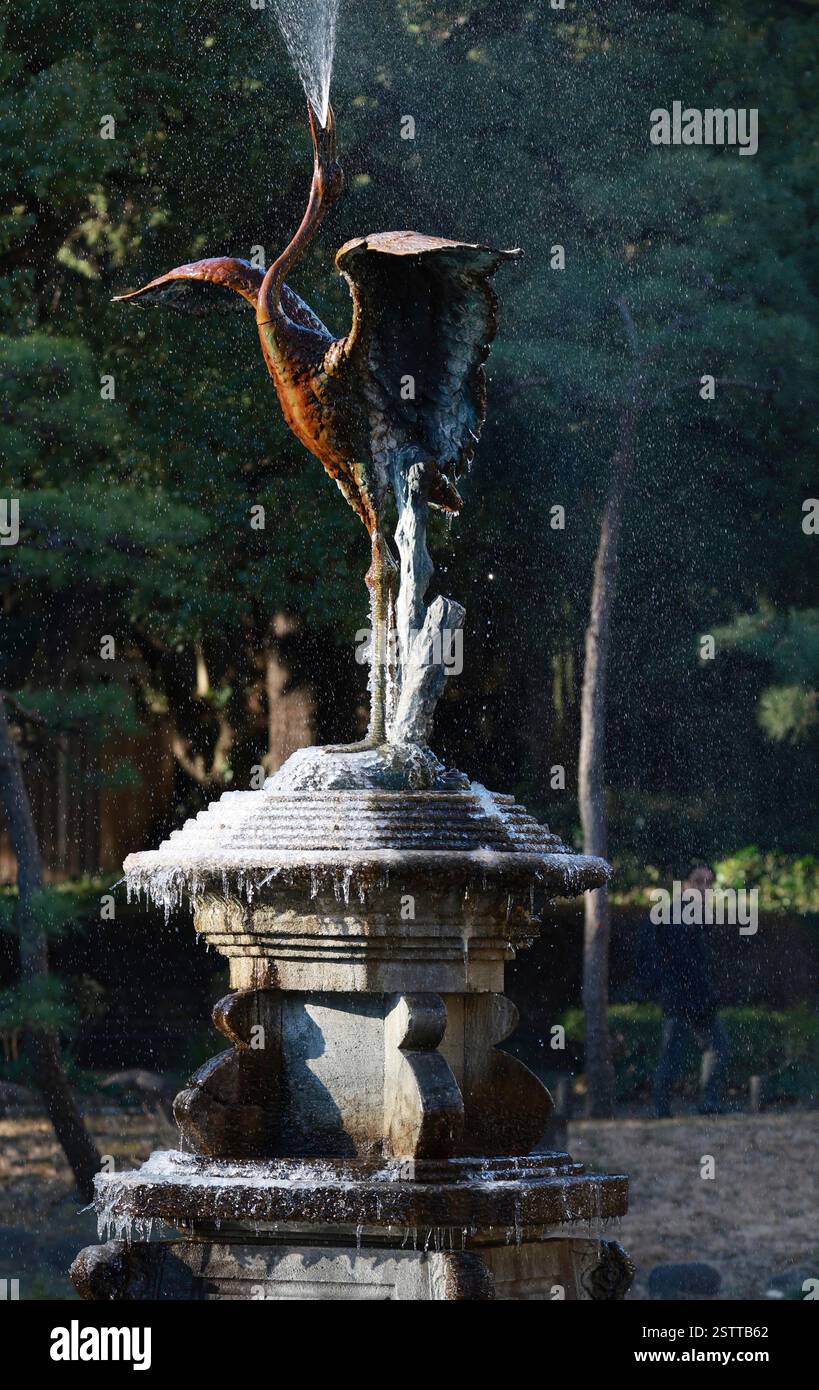 The Crane Fountain is frozen due to the severe cold at Hibiya Park in ...