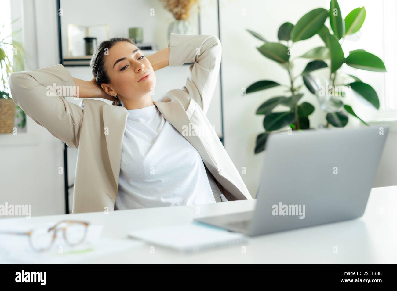 Calm pretty caucasian business woman, company manager relaxing ...