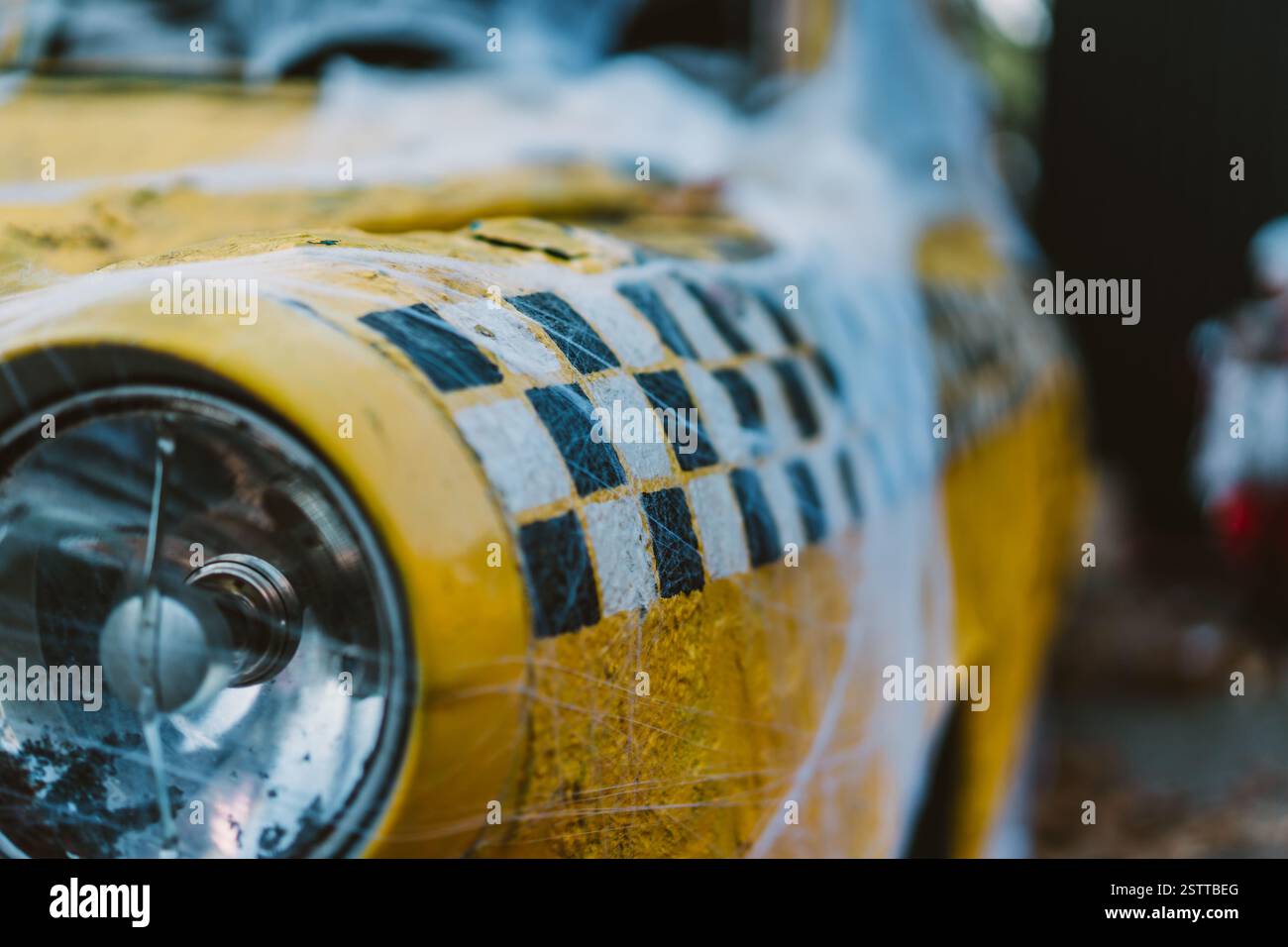 Old retro yellow taxi decorated with cobwebs Stock Photo - Alamy