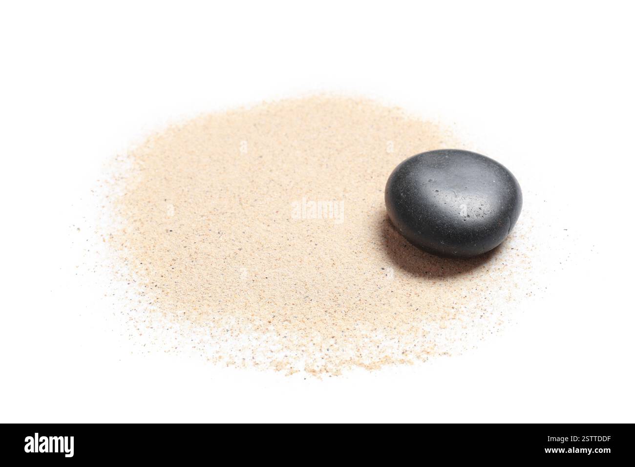 Light beach sand with black pebble on white background Stock Photo - Alamy