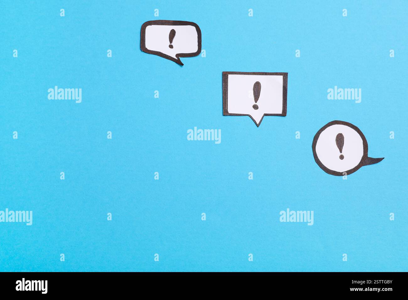 Speech bubbles with exclamation marks on color background Stock Photo ...