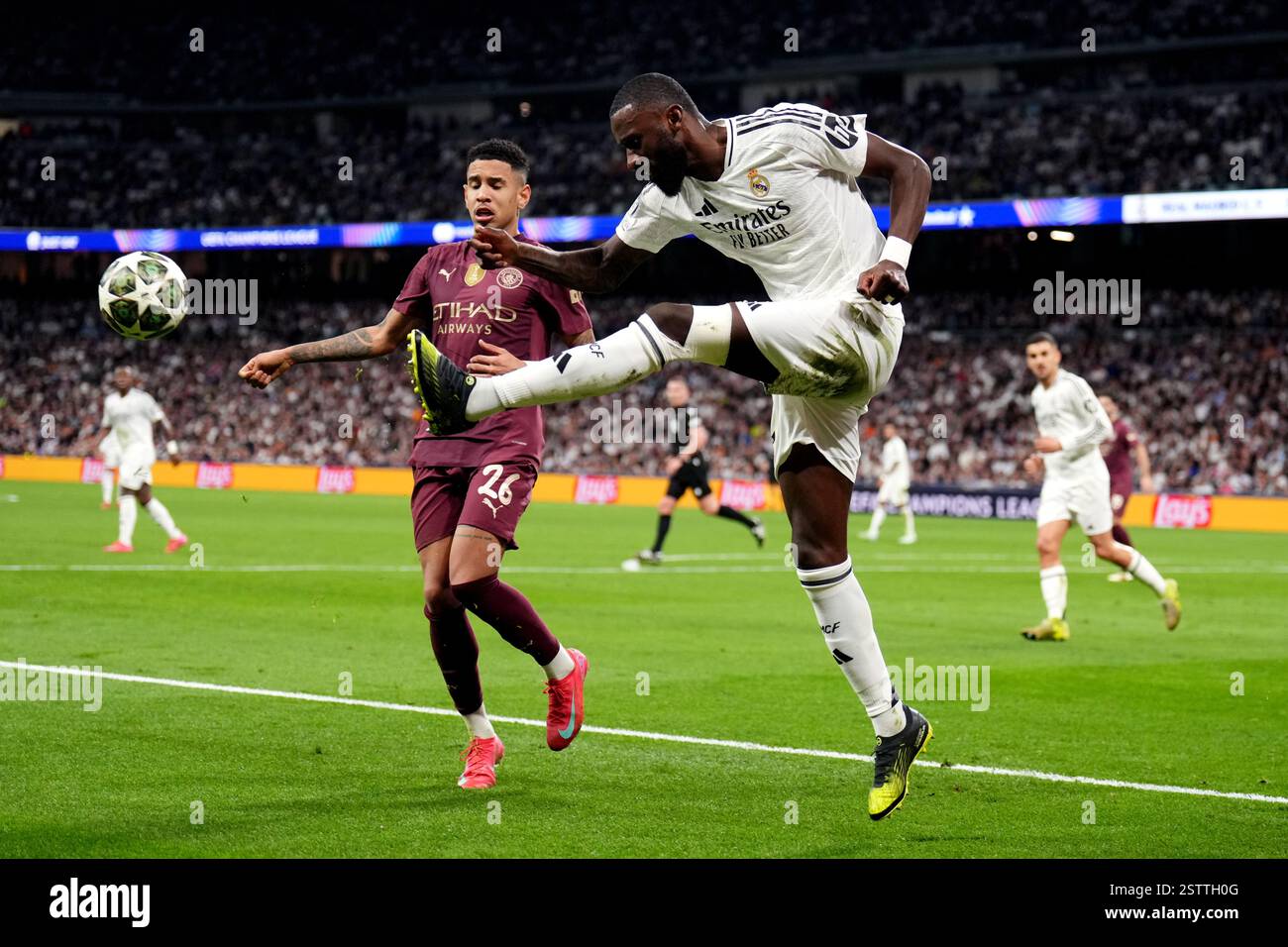 Real Madrid's Antonio Rudiger clears under pessure from Manchester City ...