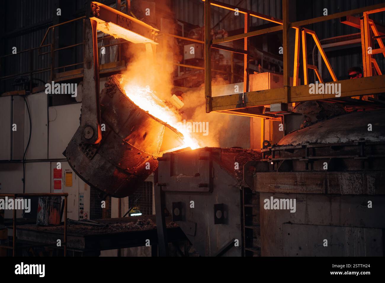 Molten copper pouring steel ladle hi-res stock photography and images ...