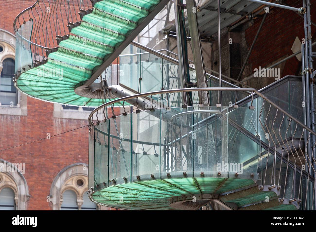 External spiral stairway glass steps and steel hi-res stock photography ...