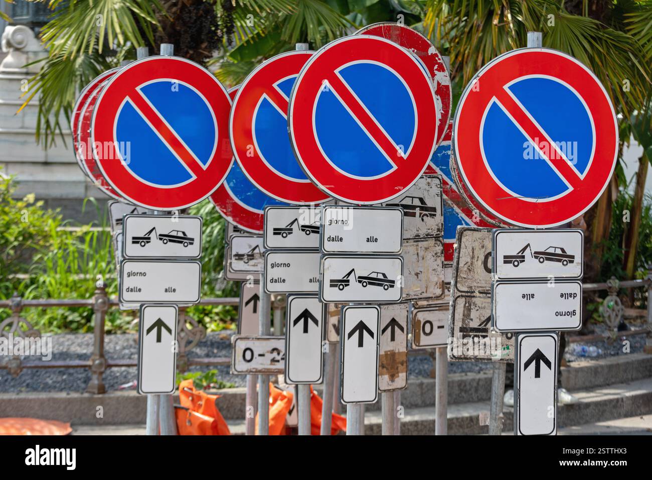 Many temporary no parking traffic signs at street hi-res stock ...