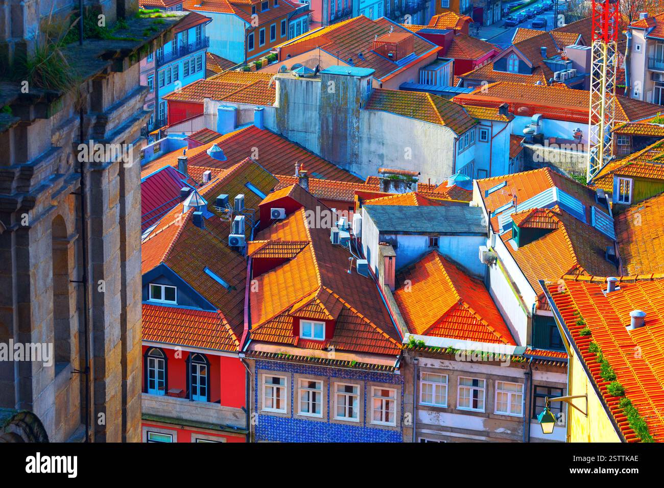 Vibrant rooftops of European city with colorful facades and terracotta ...