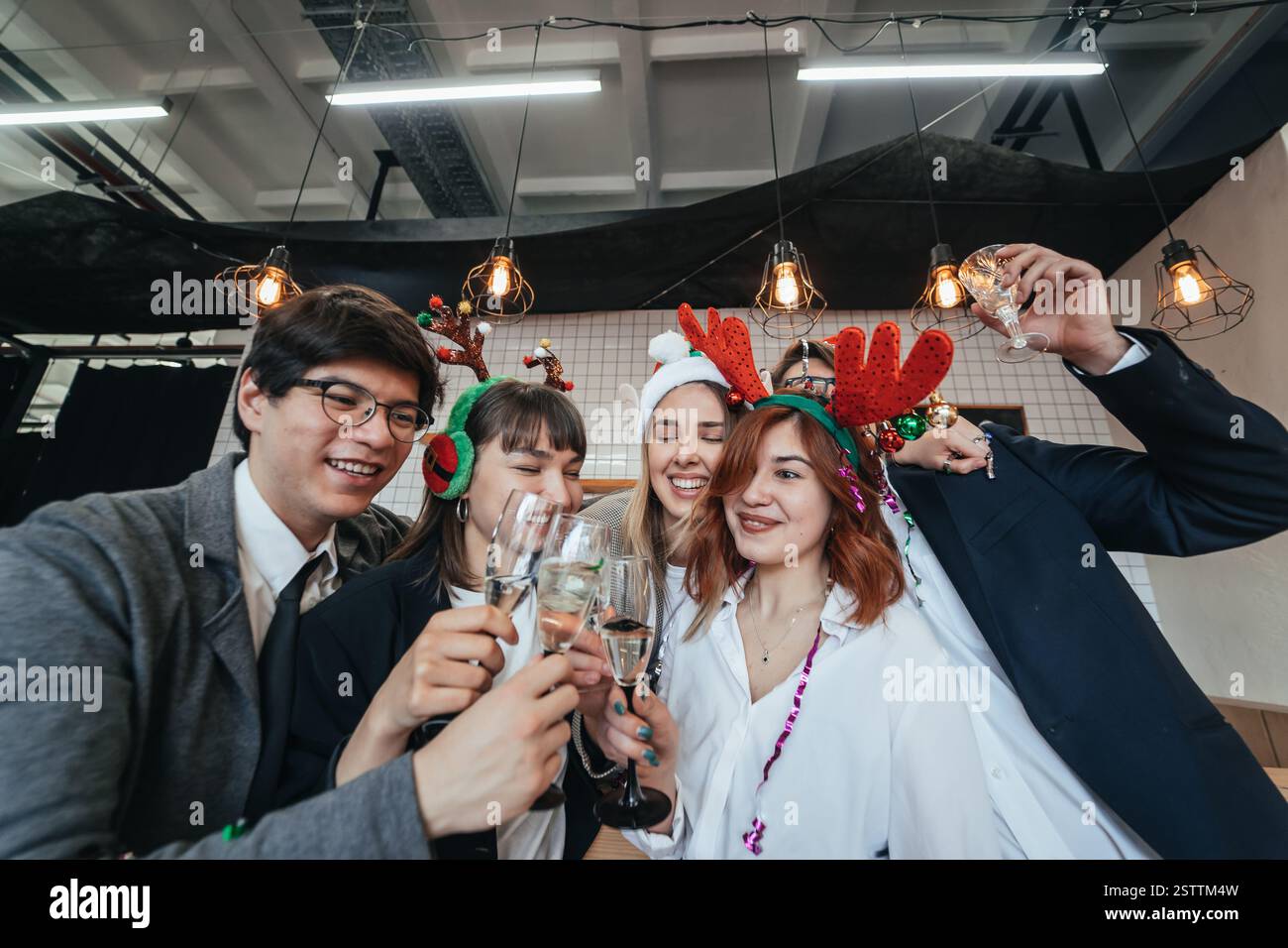 Happy colleagues in office celebrate special event Stock Photo - Alamy