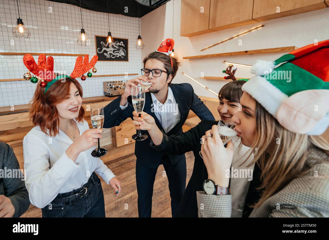 Happy colleagues in office celebrate special event Stock Photo - Alamy