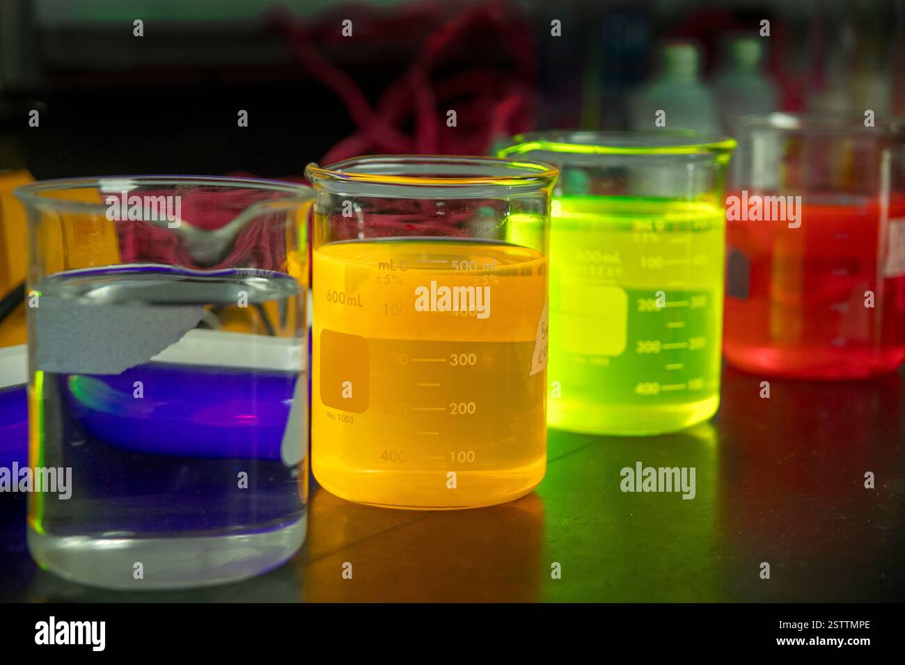 Ultraviolet light causes the fluorescence of buffers showing the principles of light absorption ...