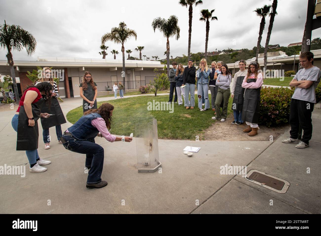 A San Clemente, CA, chemistry class watches an outdoor demonstration of ...