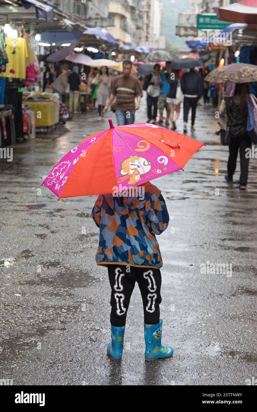 Child china rain hi-res stock photography and images - Alamy