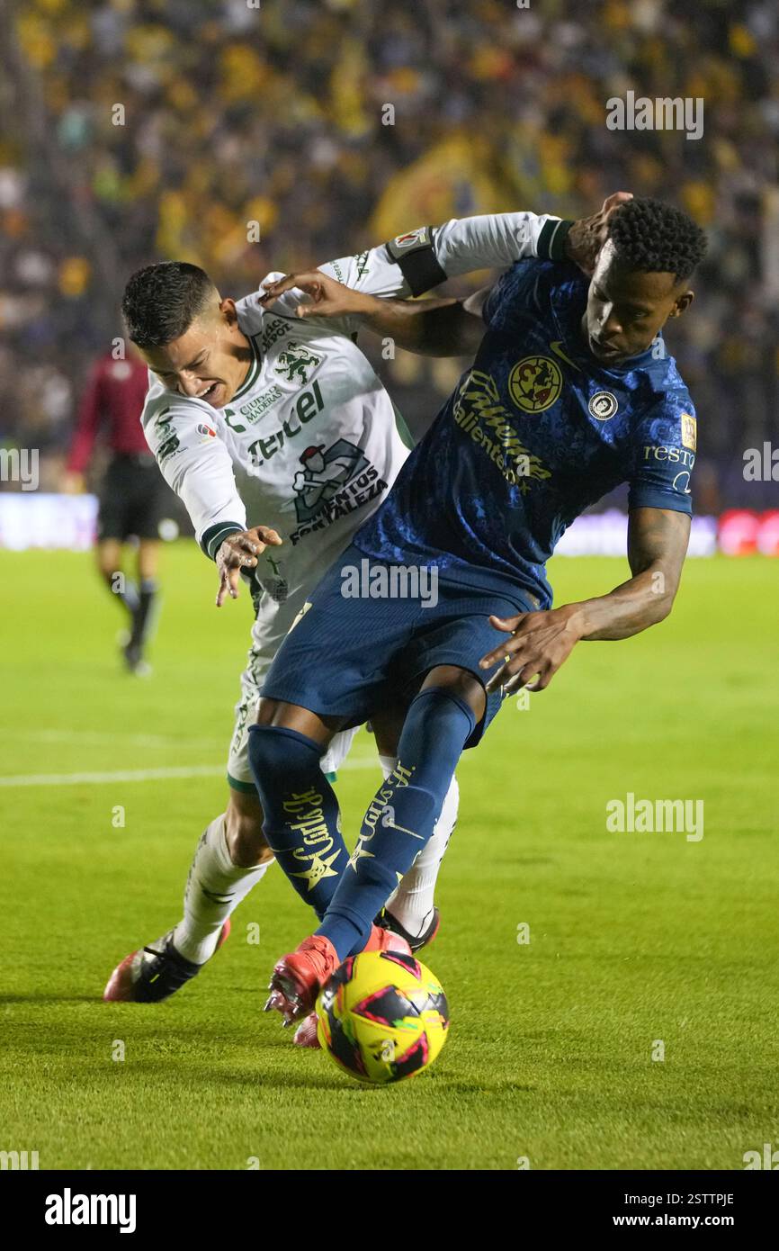 America's Cristian Borja, right, and Leon's James Rodriguez battle for the ball during a Mexican ...