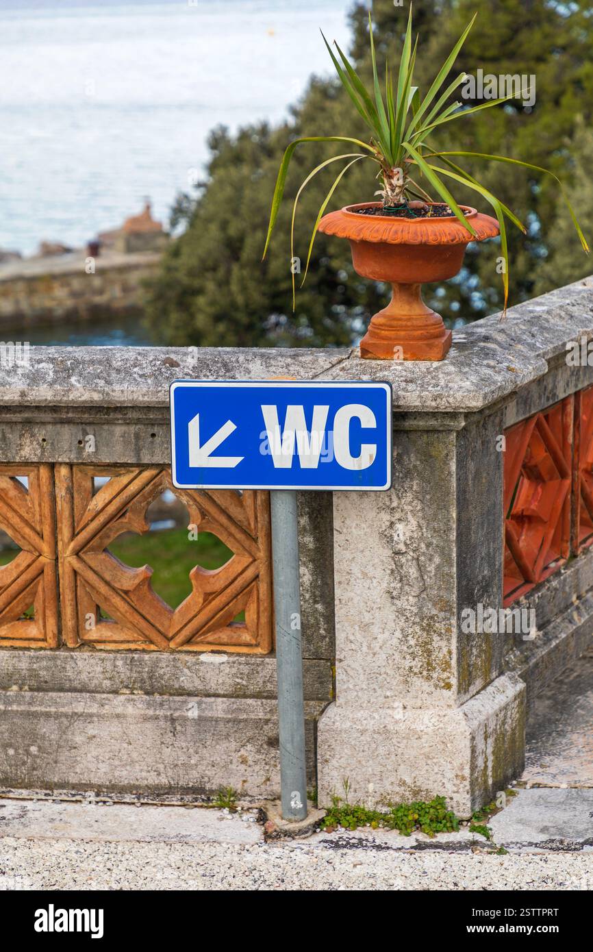 WC Arrow Toilet Direction Sign Pole Outdoor Stock Photo - Alamy