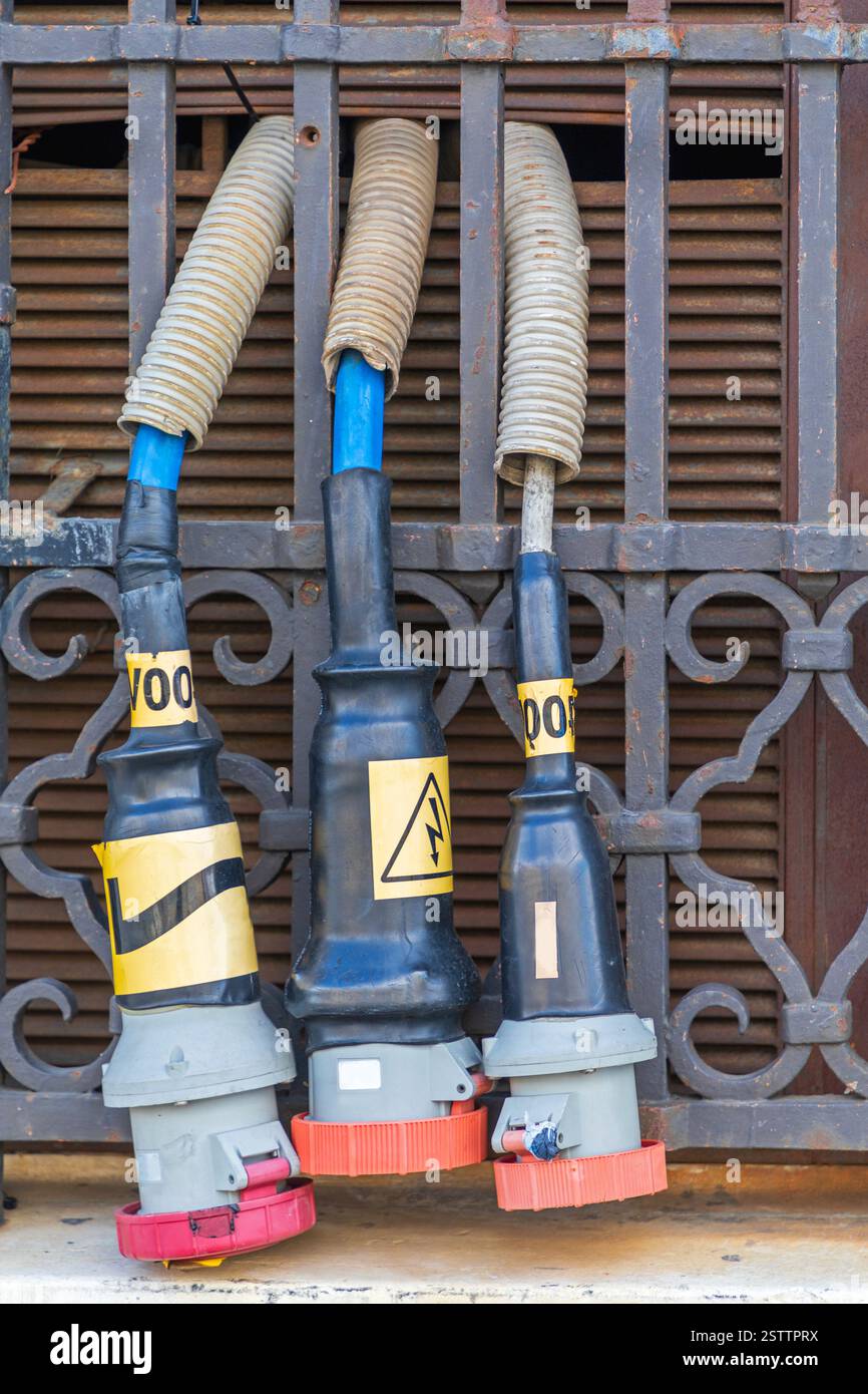 Three High Voltage Electric Energy Power Cables Stock Photo - Alamy