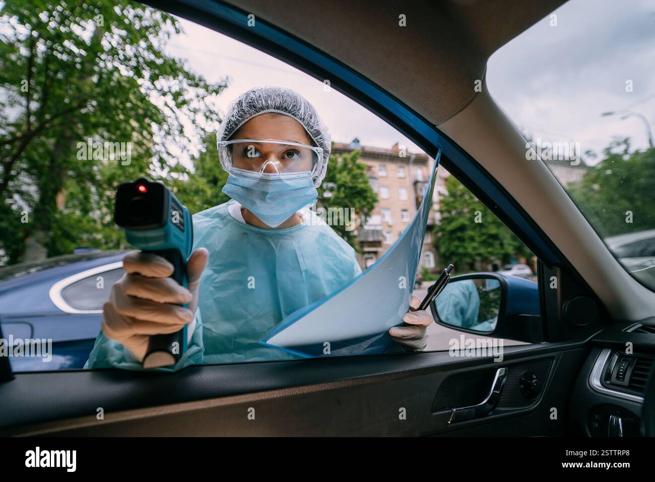 Infrared forehead thermometer gun hi-res stock photography and images ...