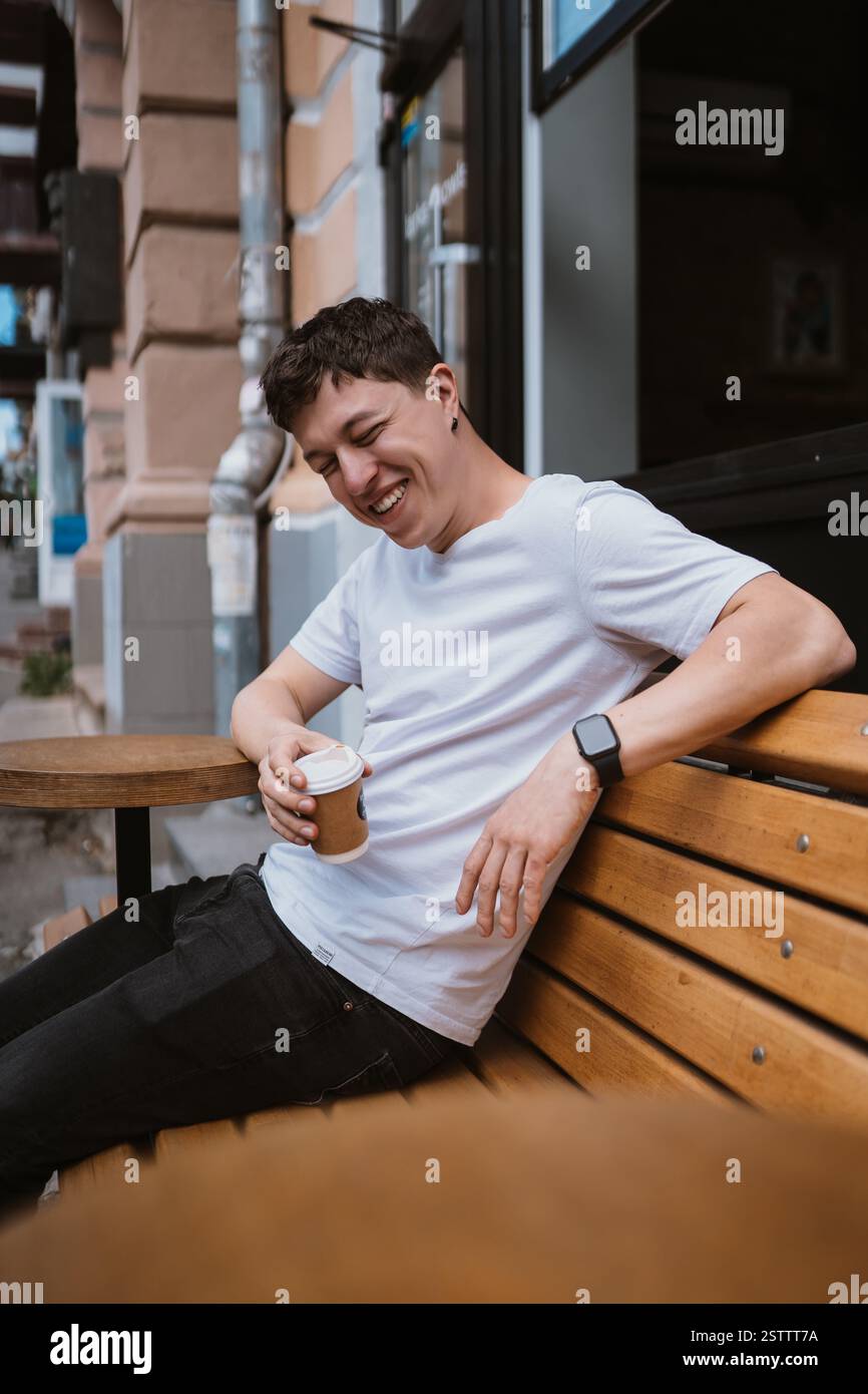 Man sitting street cafe hi-res stock photography and images - Alamy