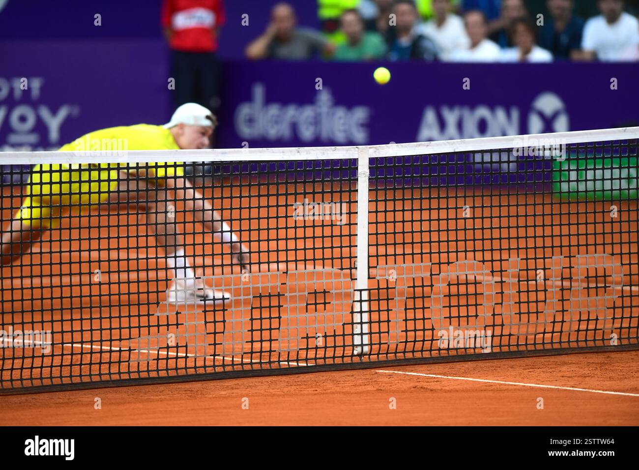 Holger Rune (Denmark) behind the tennis net with ATP Tour Logo ...