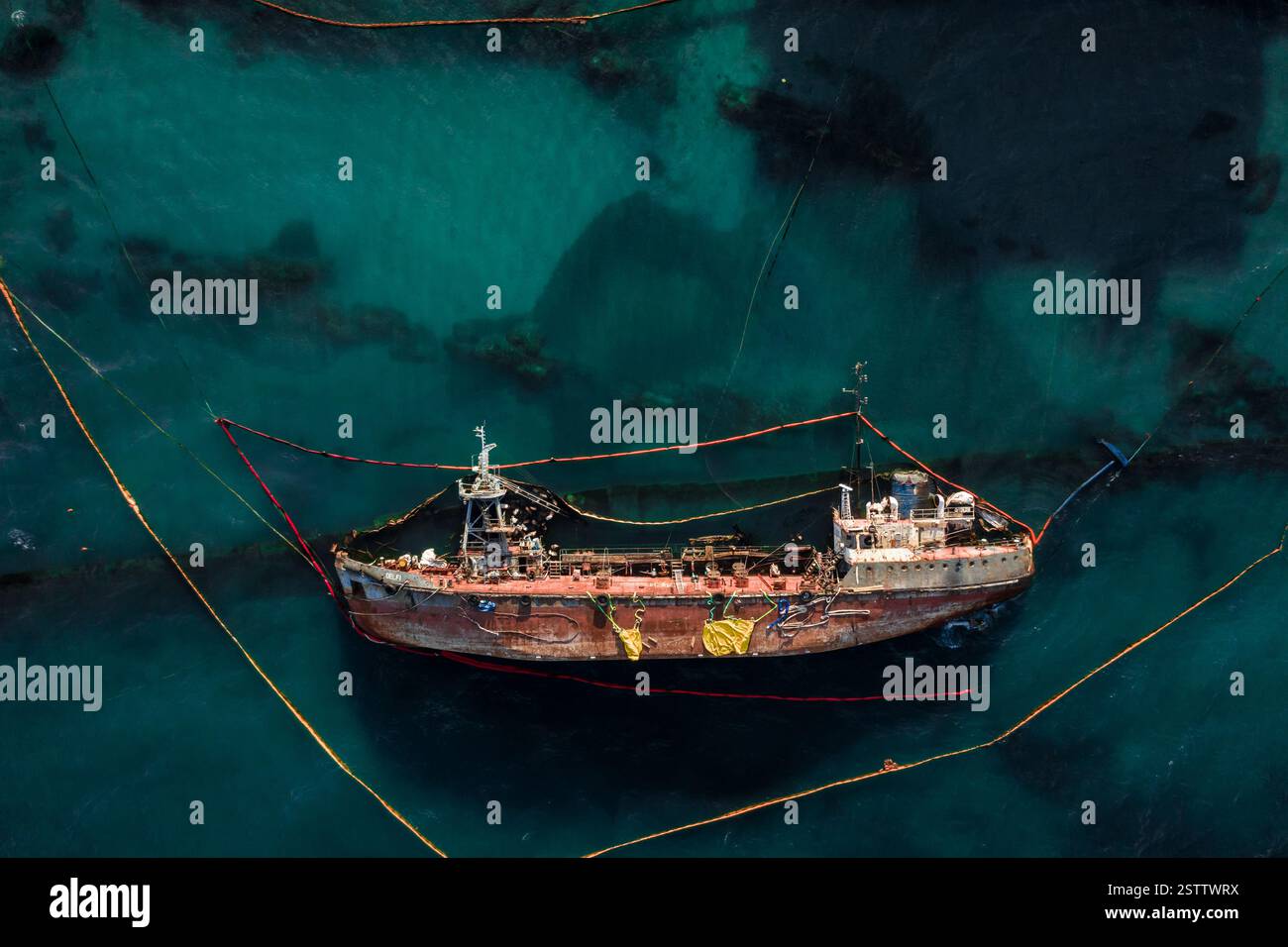 Top view of an old tanker that ran aground and overturned Stock Photo ...