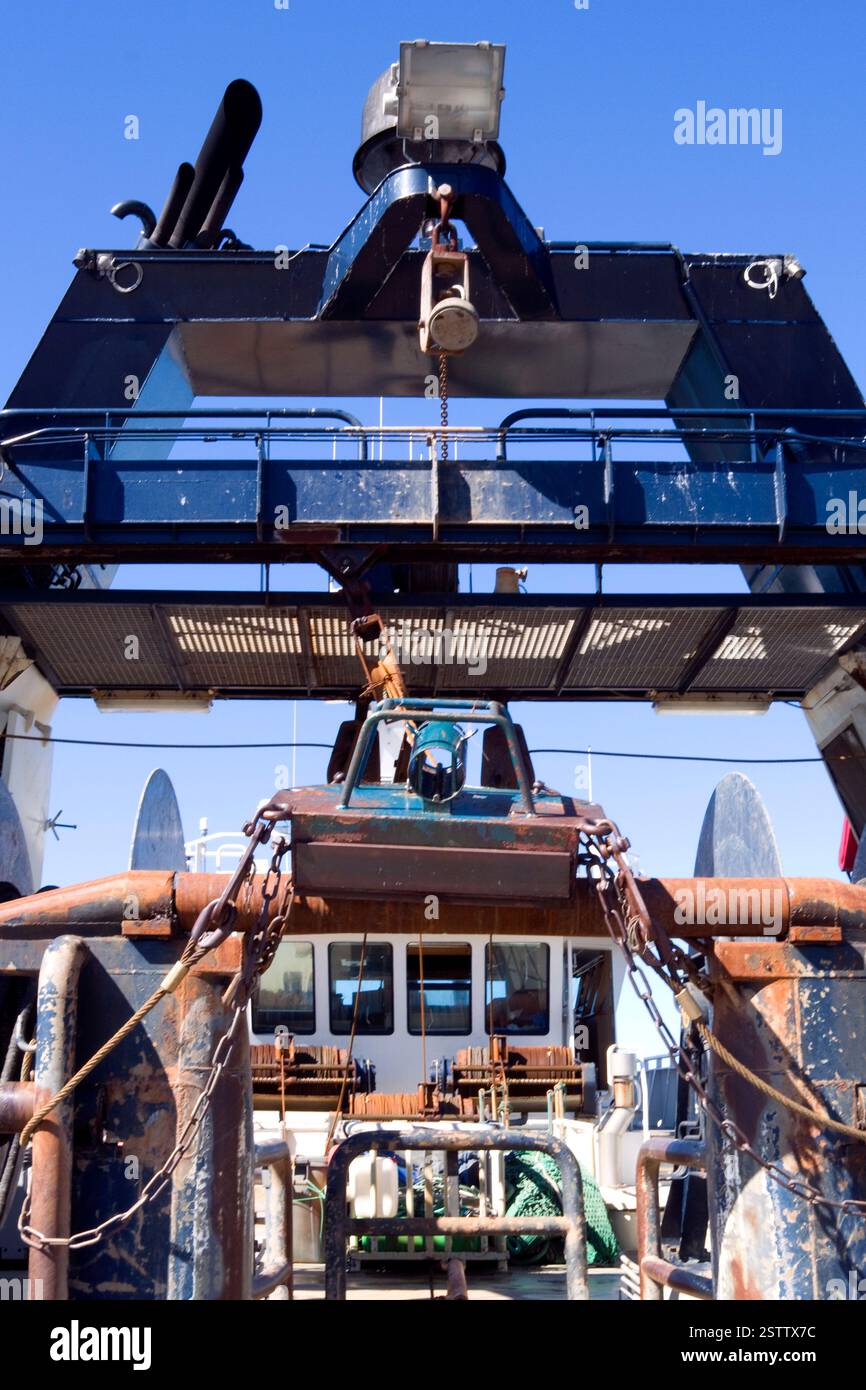 Laesoe, Denmark: Gantry of a modern stern trawler in the fishing port ...