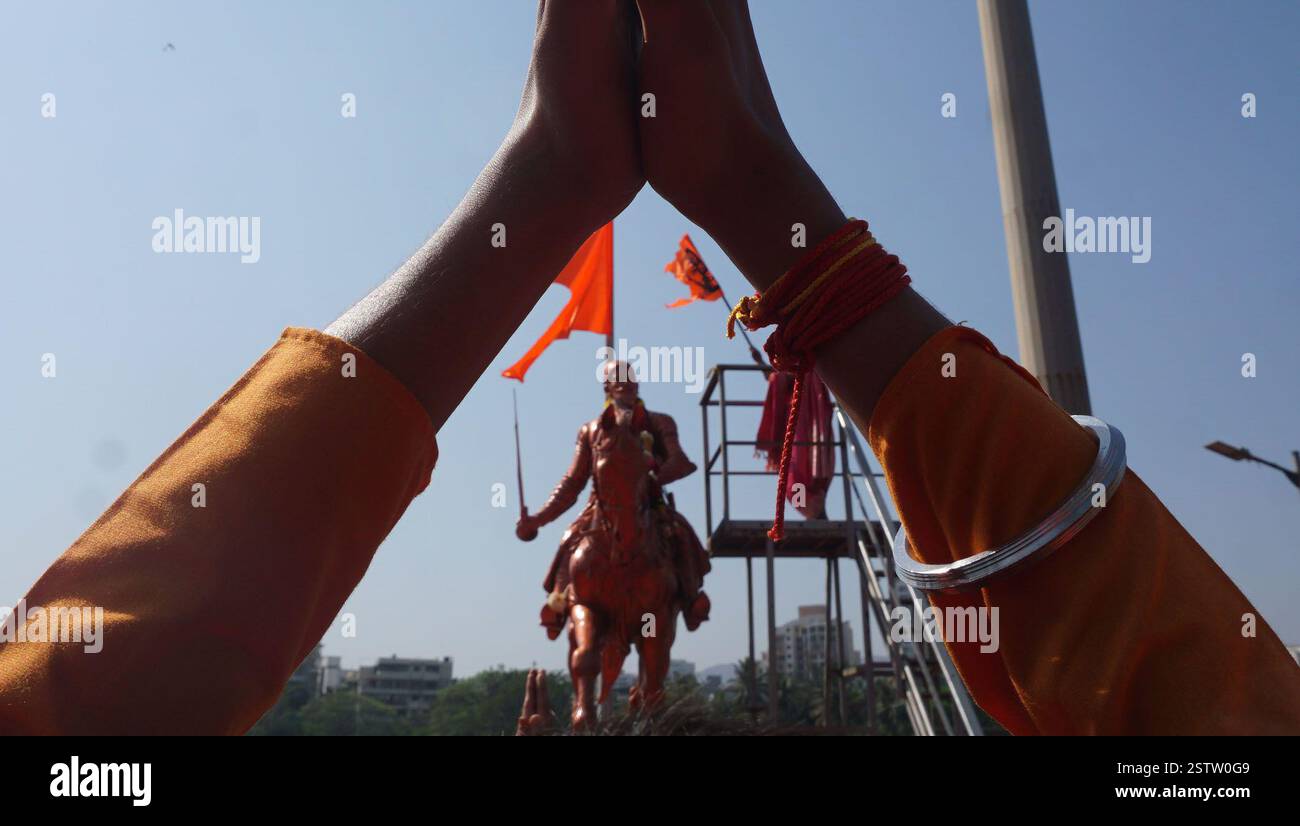 THANE, INDIA - FEBRUARY 19: Devotees are seen saluting the statue of ...