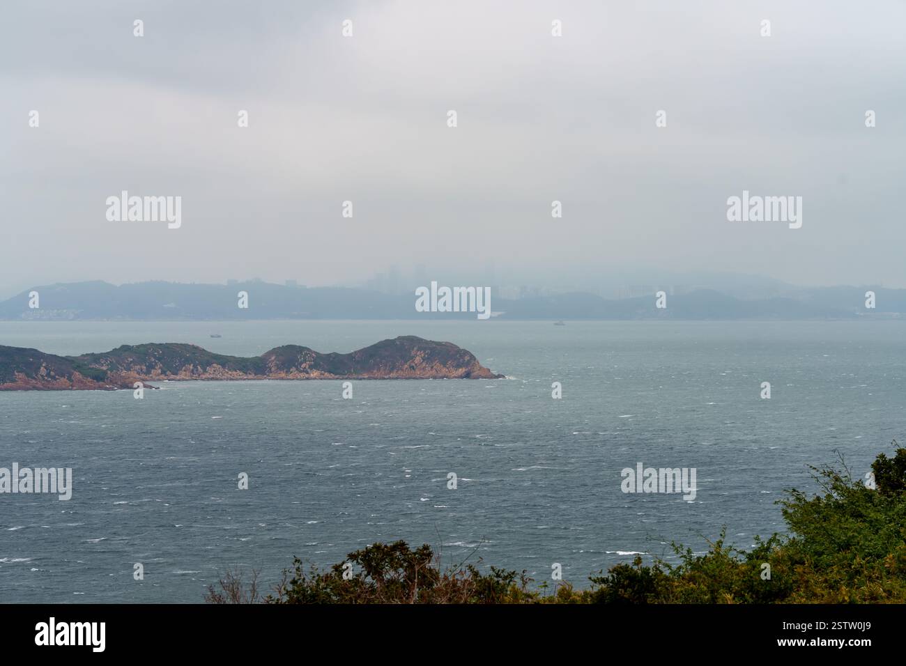 Wild view of sea, moutain and hills Stock Photo - Alamy