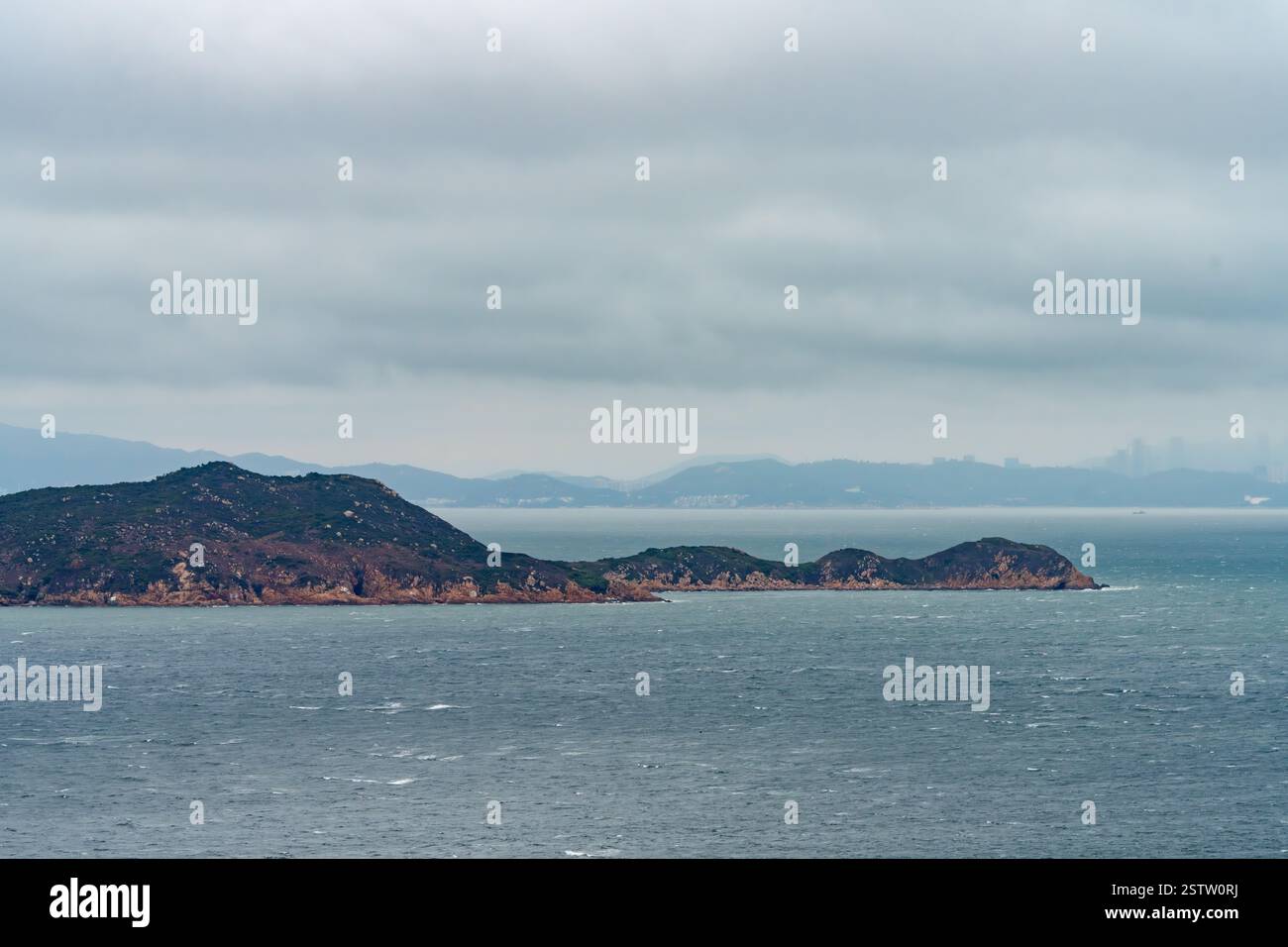 Wild view of sea, moutain and hills Stock Photo - Alamy