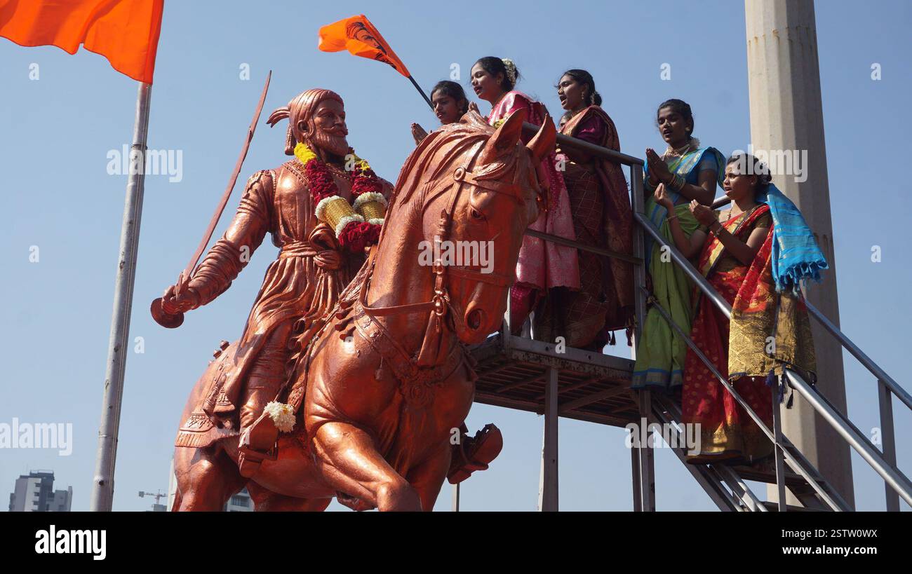 THANE, INDIA - FEBRUARY 19: Devotees are seen saluting the statue of ...