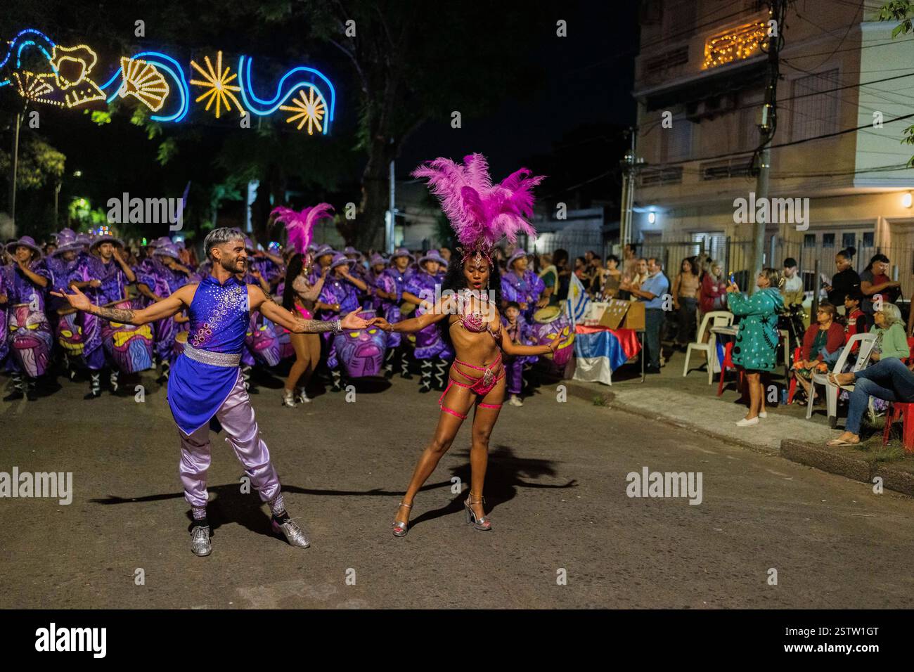 Candombe dancers perform with the public during a Carnival parade in ...