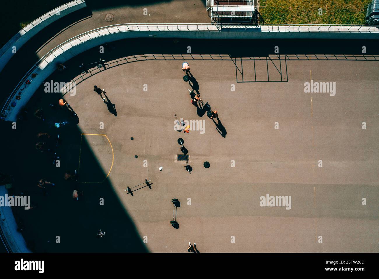 Aerial footage of a sports ground, people doing weightlifting Stock ...