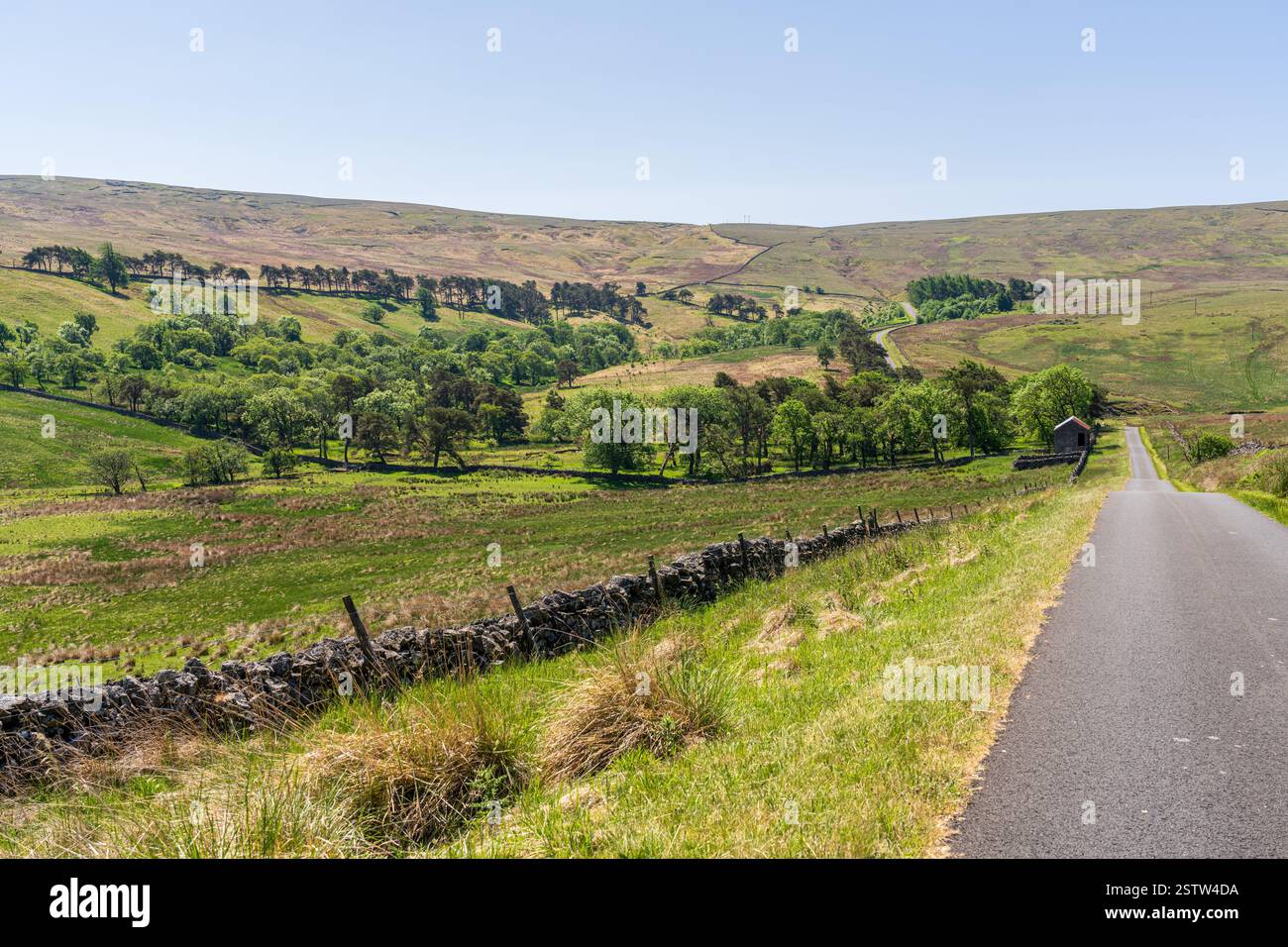 Rural road in the Peak District between Daddry Shield and Newbiggin ...