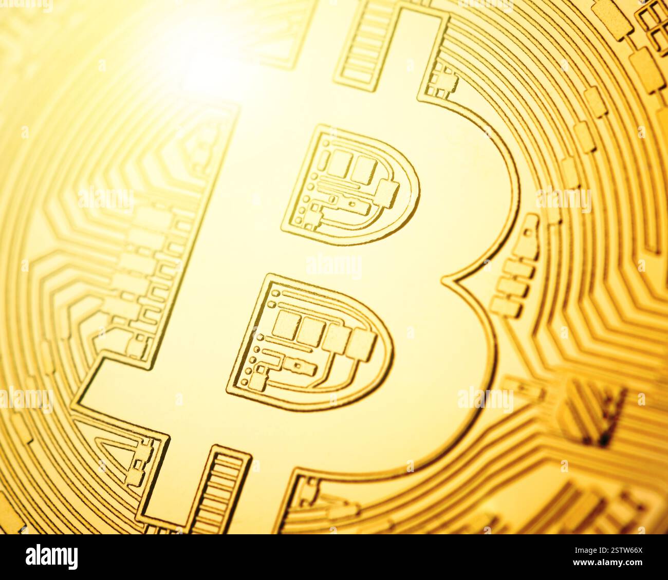 Macro shot of physical cryptocurrency Bitcoin, golden coin with lens ...