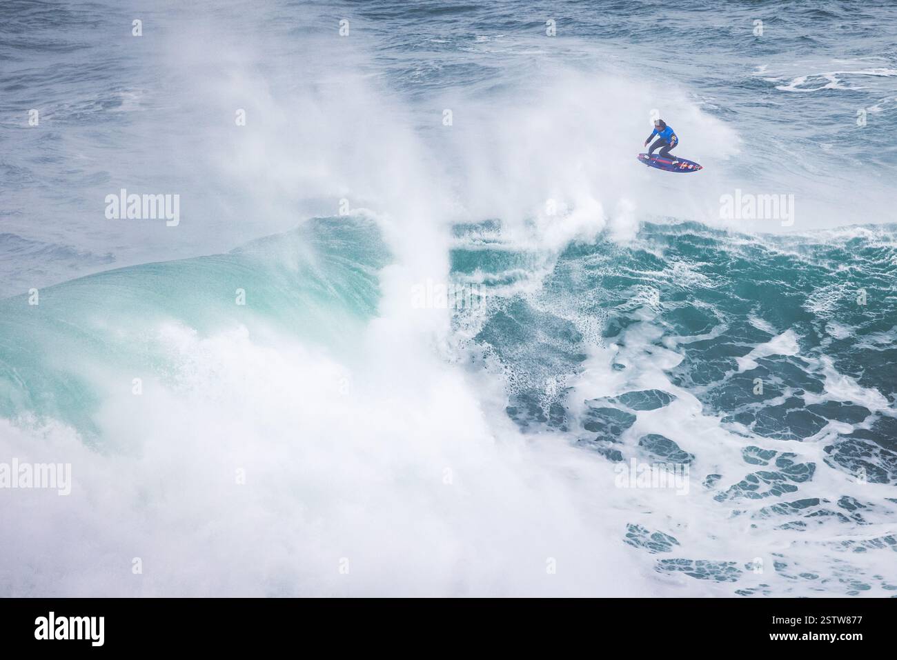 Nazare, Portugal. 18th Feb, 2025. Hawaiian surfer Kai Lenny rides a ...