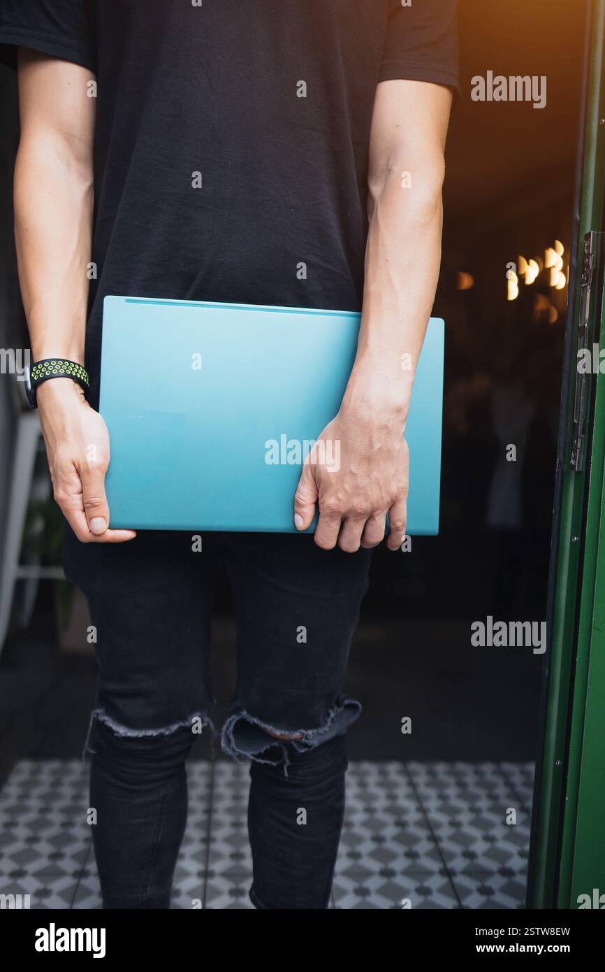 Guy closed laptop in hi-res stock photography and images - Alamy