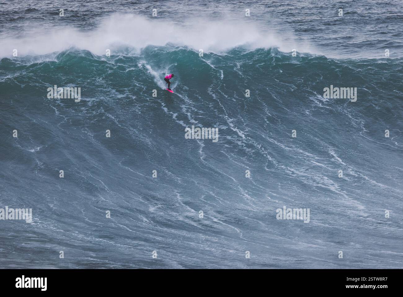 Nazare, Portugal. 18th Feb, 2025. Brazilian surfer Vitor Faria rides a ...