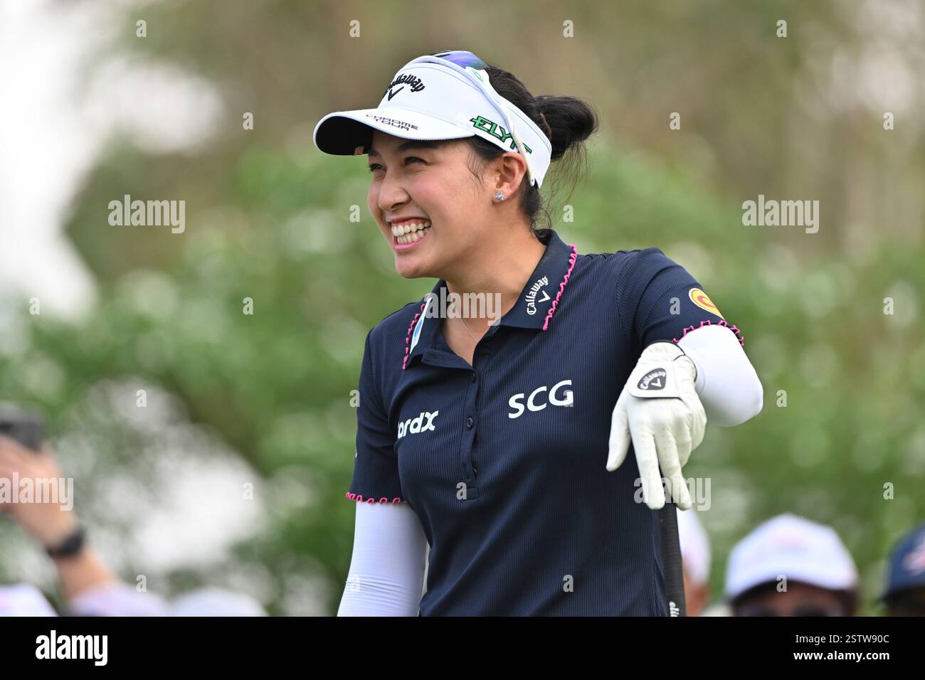 Atthaya Thitikul of Thailand reacts after playing on the 1st hole ...