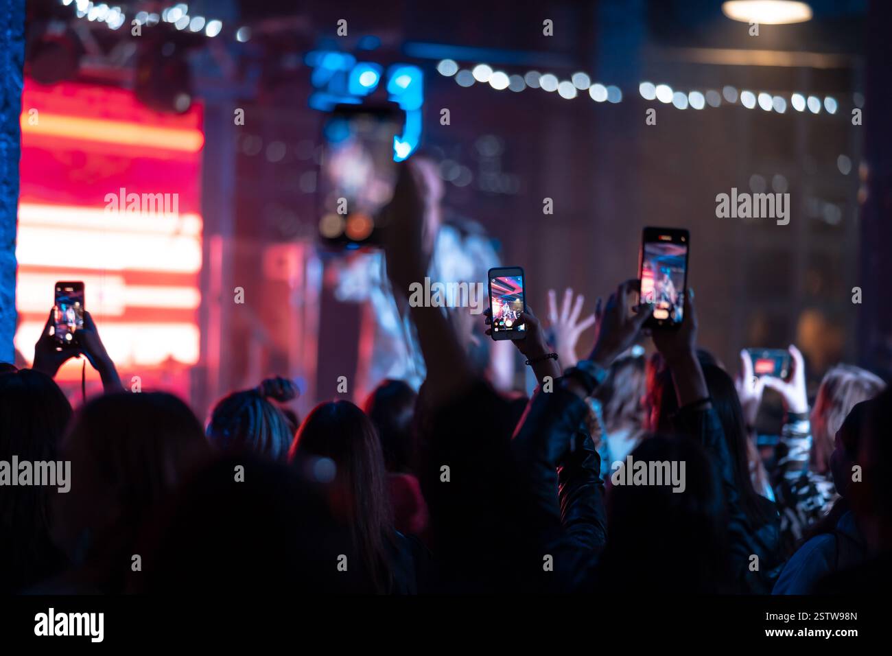 Person recording stage performance hi-res stock photography and images ...