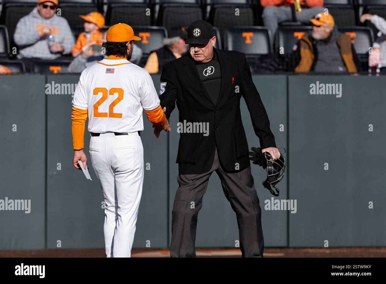 Home plate umpire Scott Kennedy takes part in the meeting prior to the ...