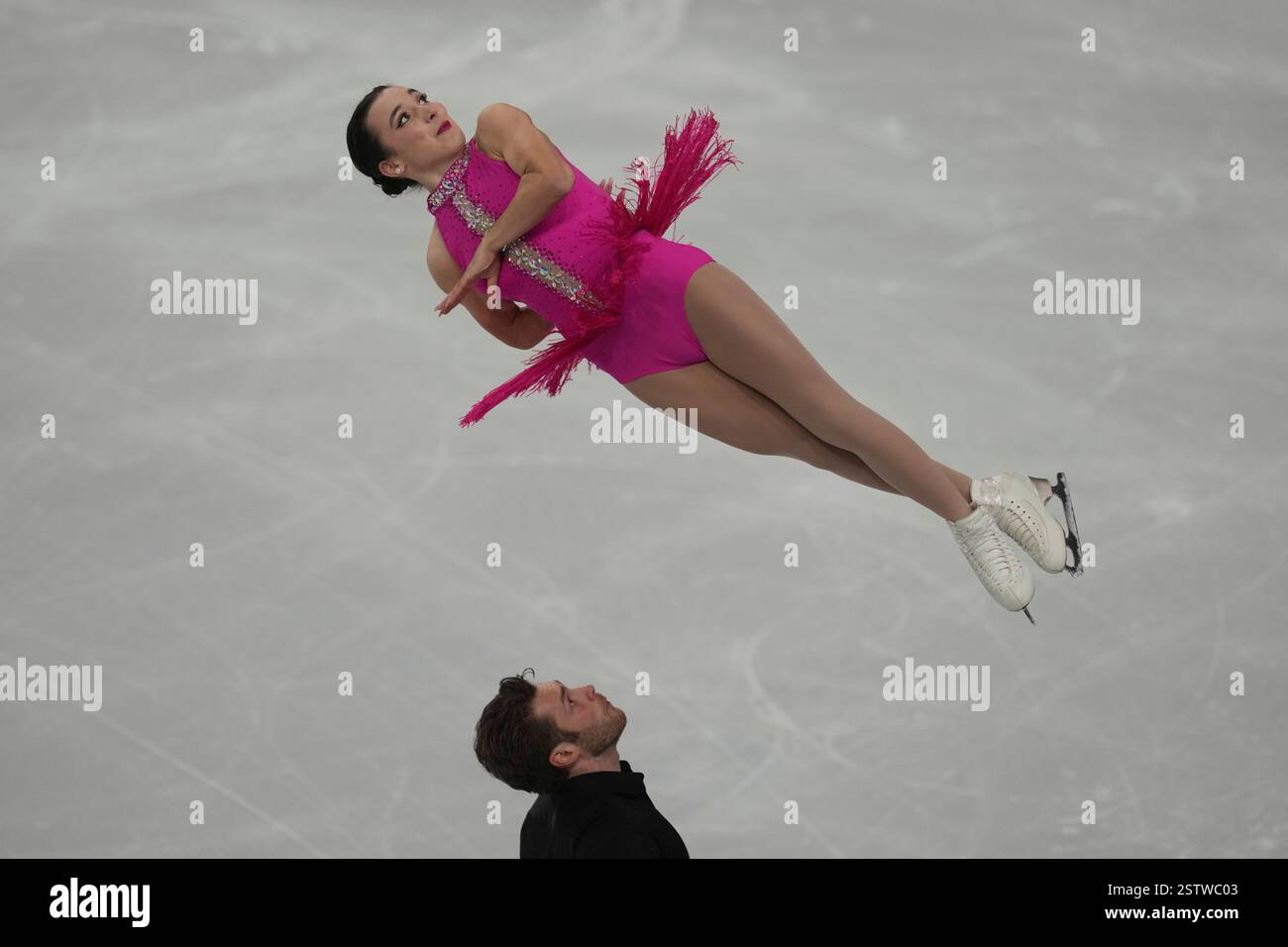Lia Pereira and Trennt Michaud, of Canada perform during the pairs ...